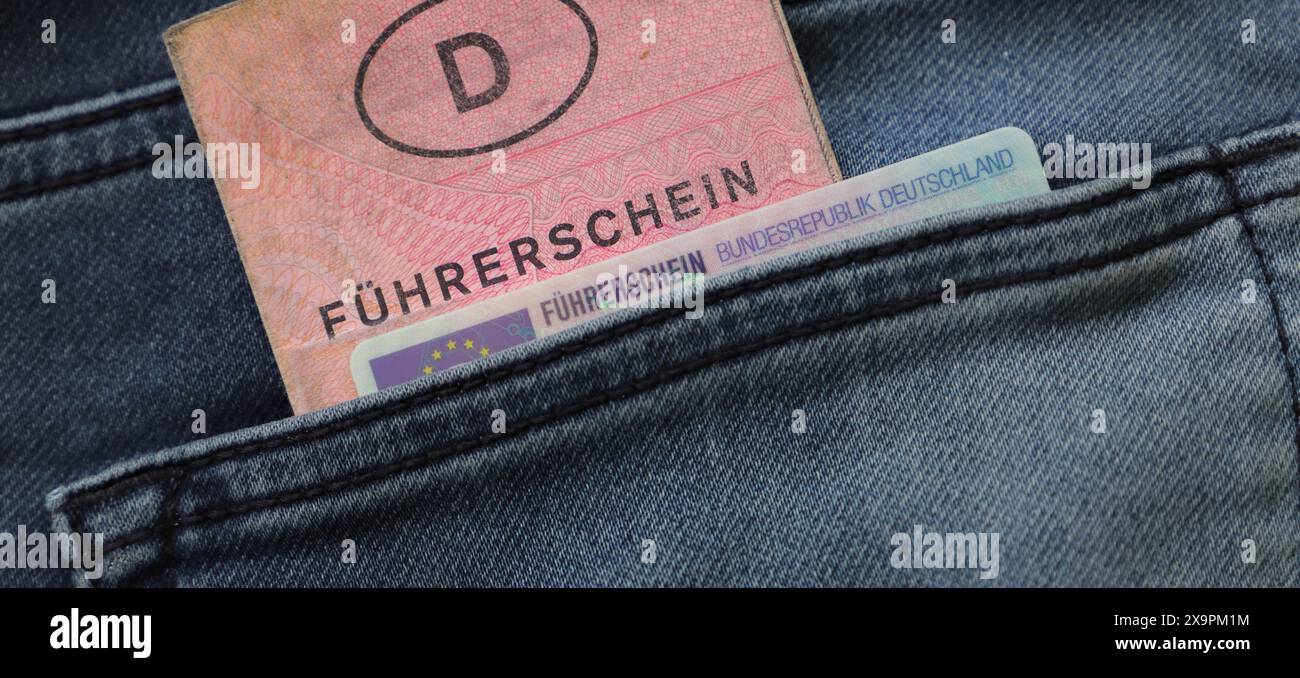 an old and a new German driving license with the inscription ...