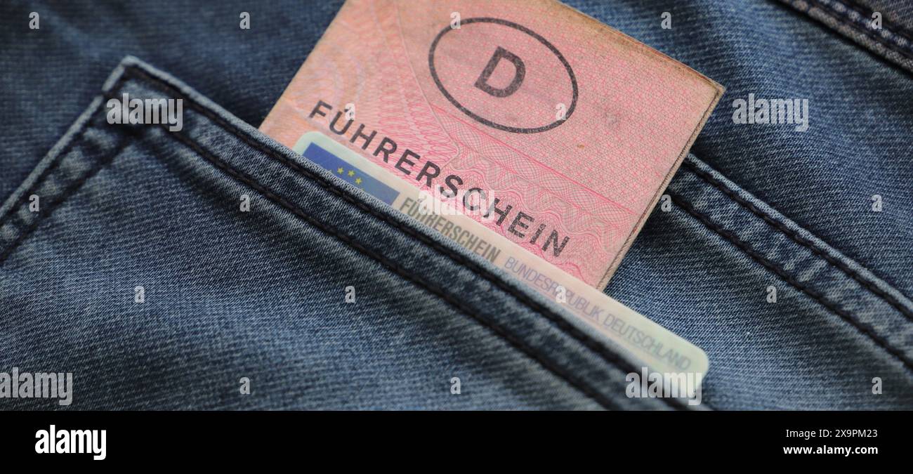 an old and a new German driving license with the inscription ...