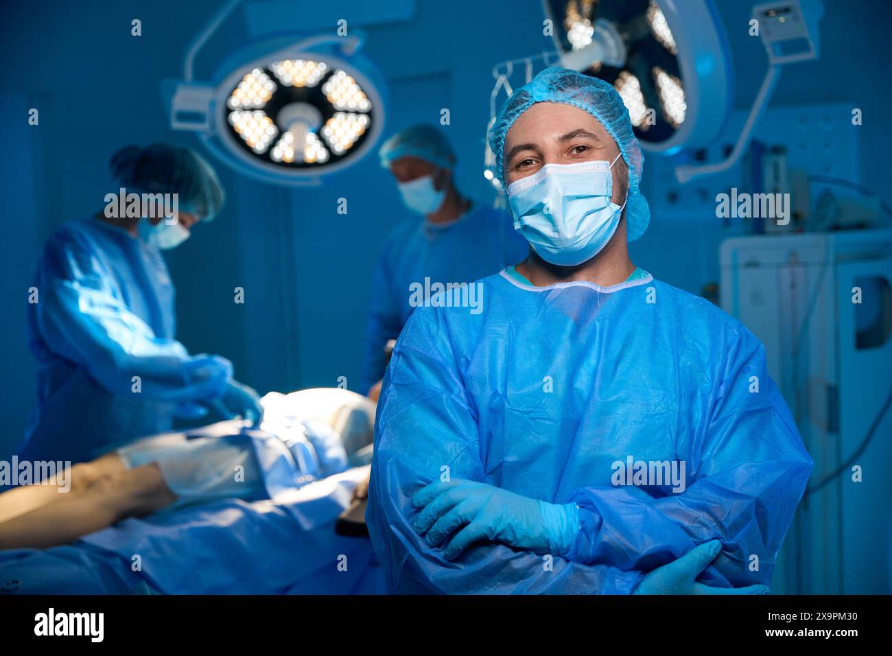 Doctor in surgical uniform in operation theater during operation Stock ...