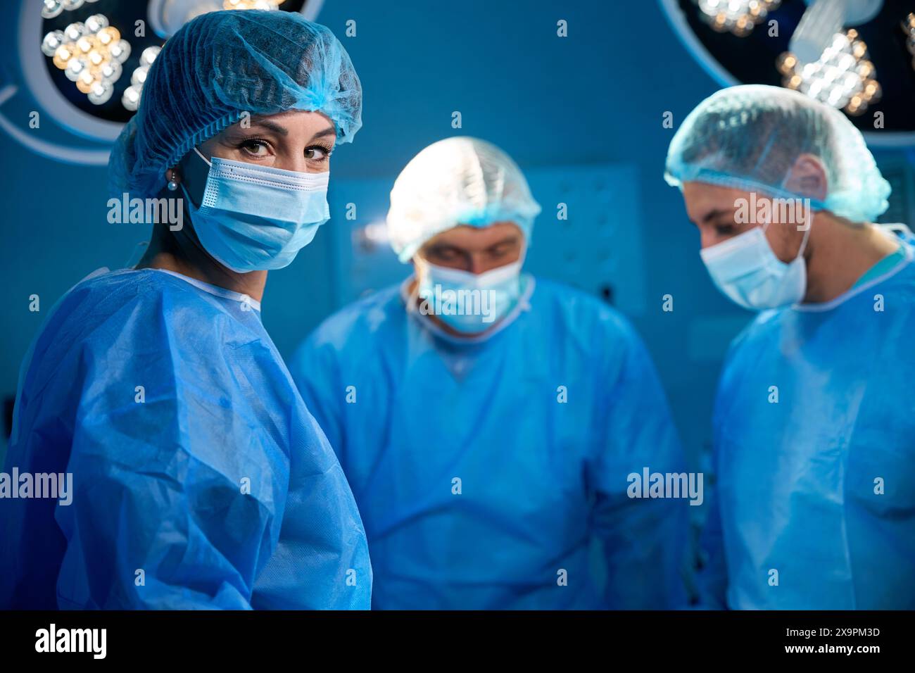 Medical team doing critical operation in medical center Stock Photo - Alamy