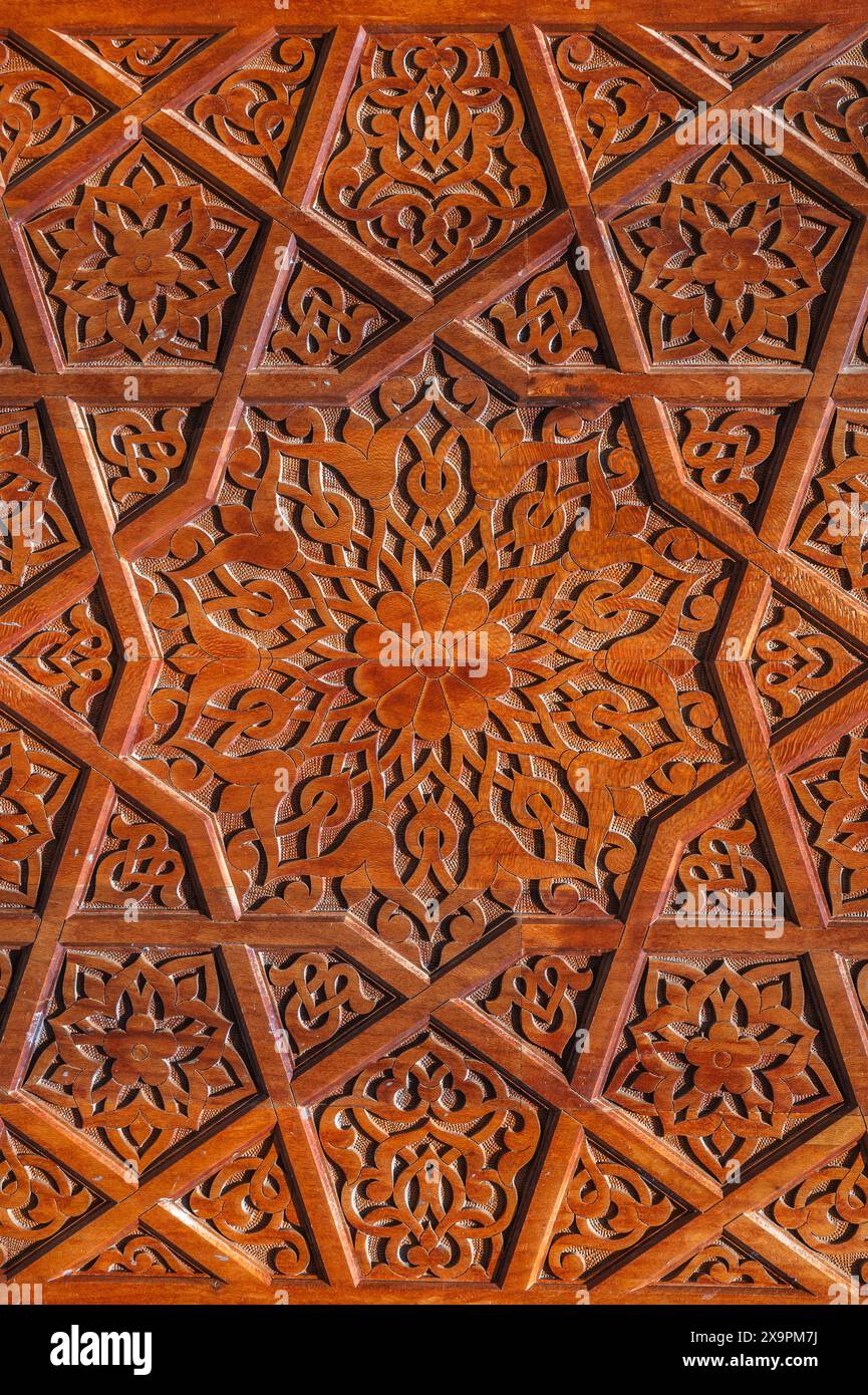 traditional Uzbek patterns arabesque ornament on an ancient wooden ...