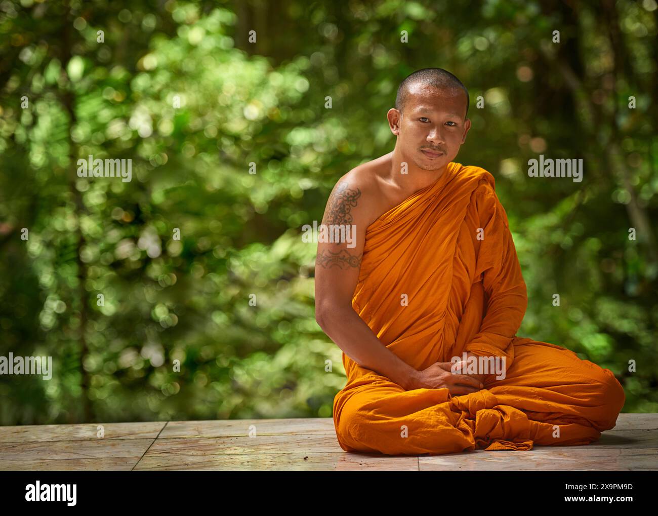 Calm, man and buddhist monk in portrait on bench for peace, zen and ...
