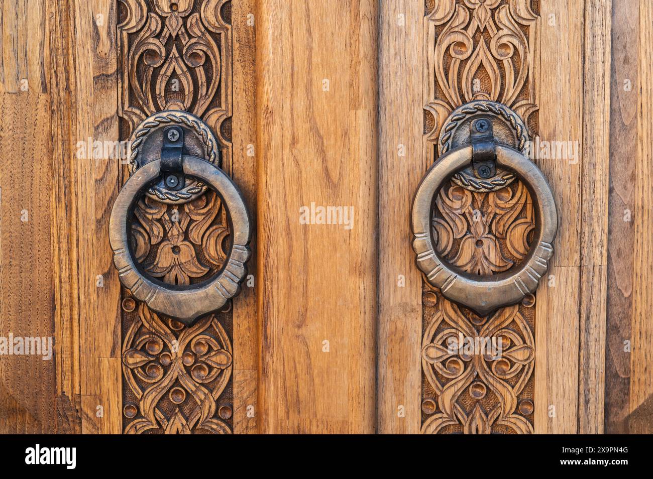 traditional Uzbek Islamic patterns ornament on an wooden carved door in ...