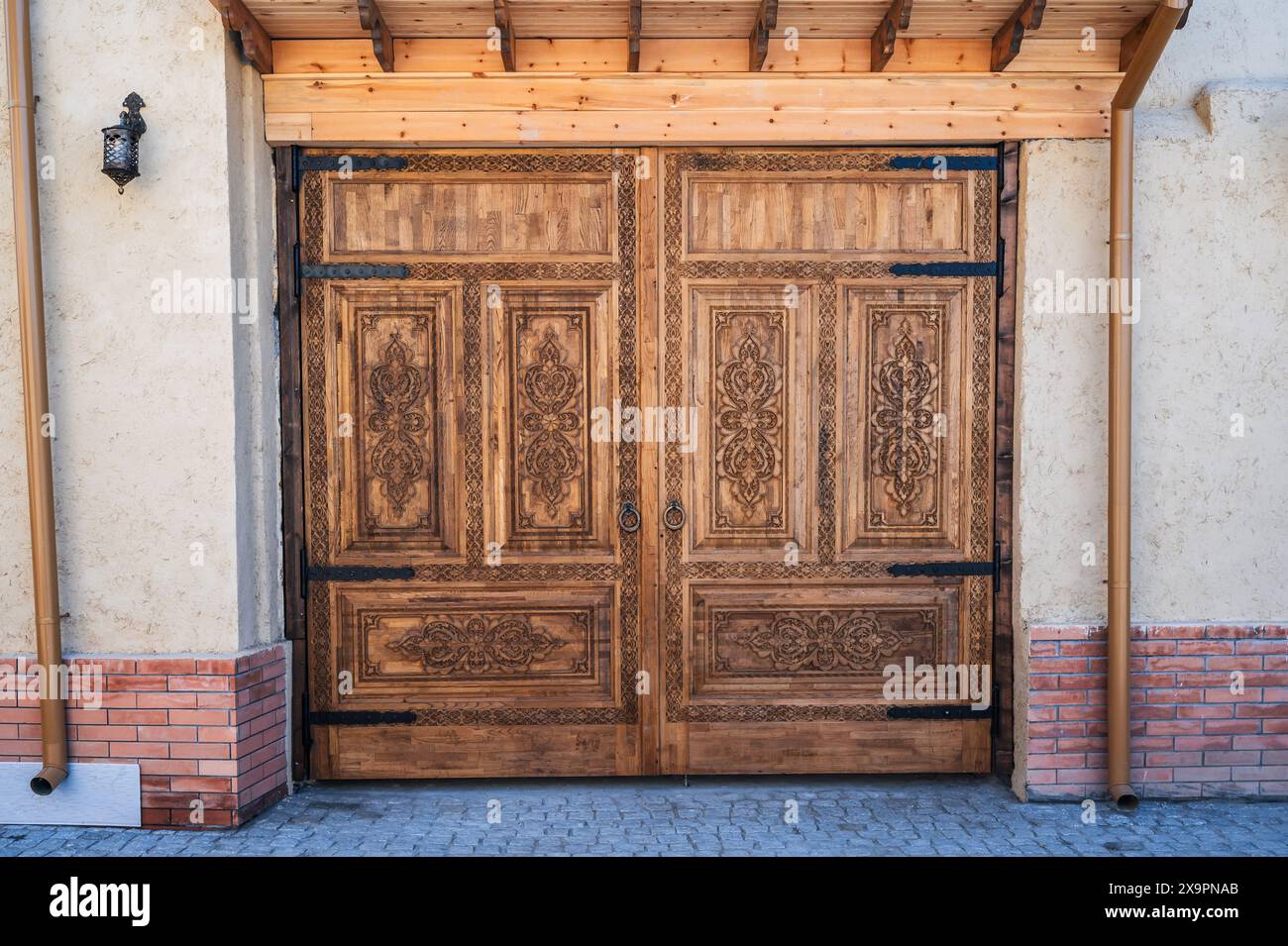 ancient carved wooden gate with oriental Tajik carved pattern ornament ...