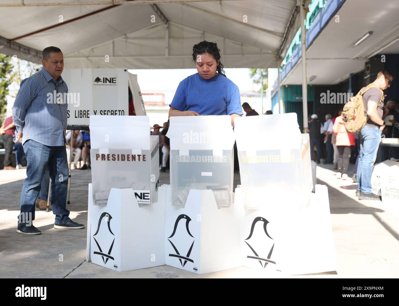 Mexico City, Mexico. 2nd June, 2024. A voter casts her ballot at a ...