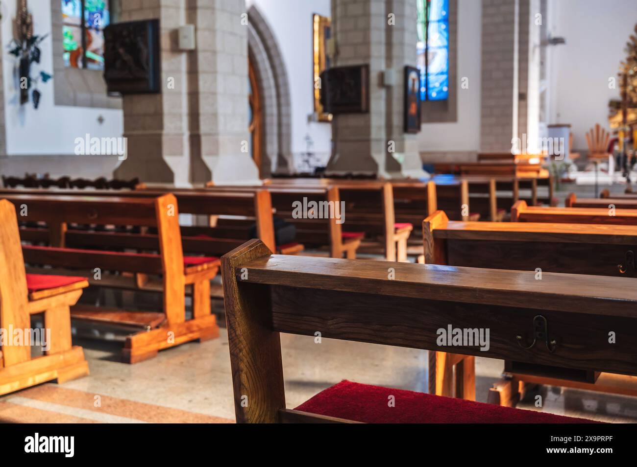 pews inside the interior of the Catholic church. Cathedral of the ...