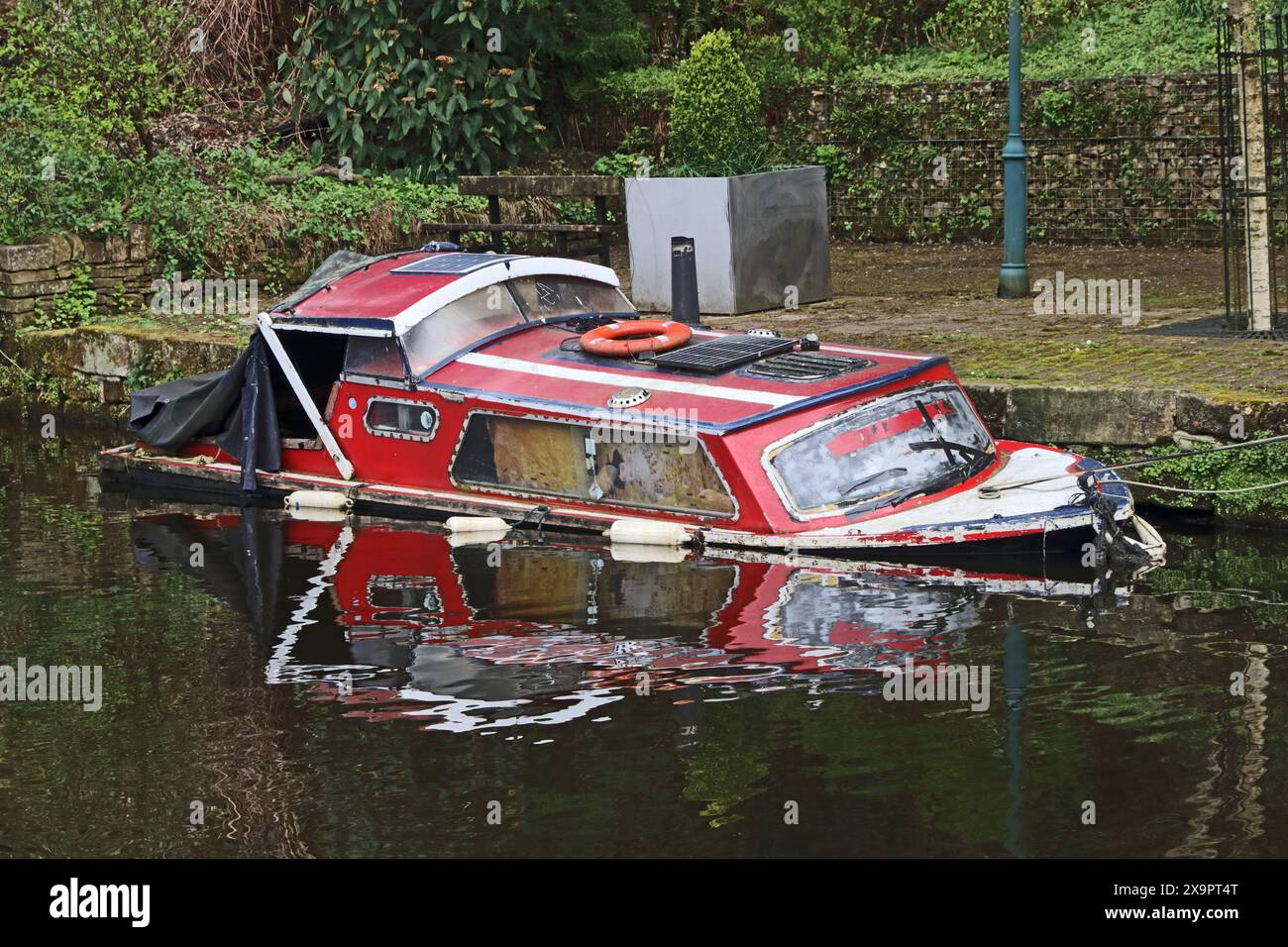 Old cabin cruiser, sunk at side of Rochdale Canal, Todmorden Stock ...