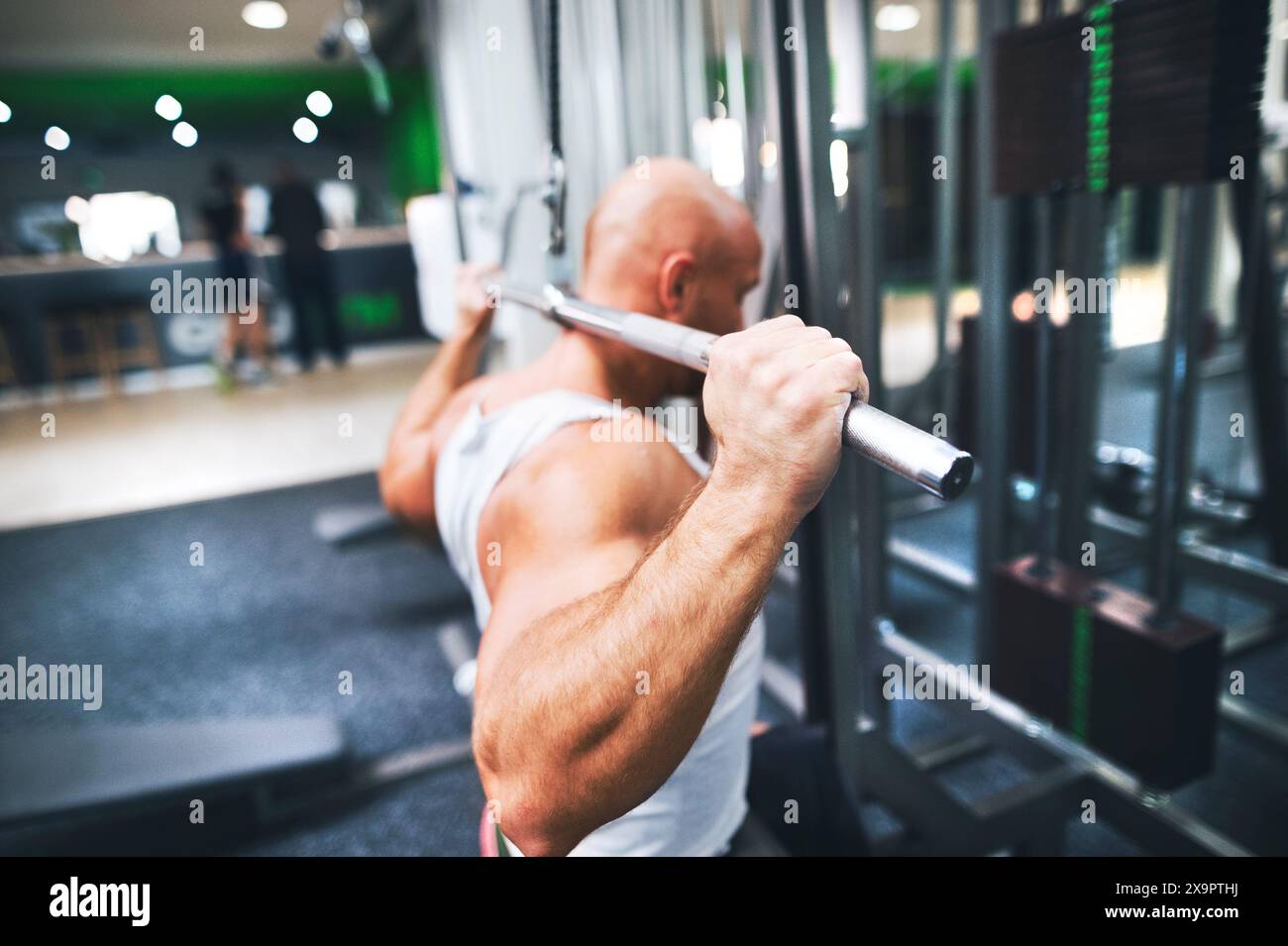 Strong man exercising in gym. Routine workout for physical and mental ...