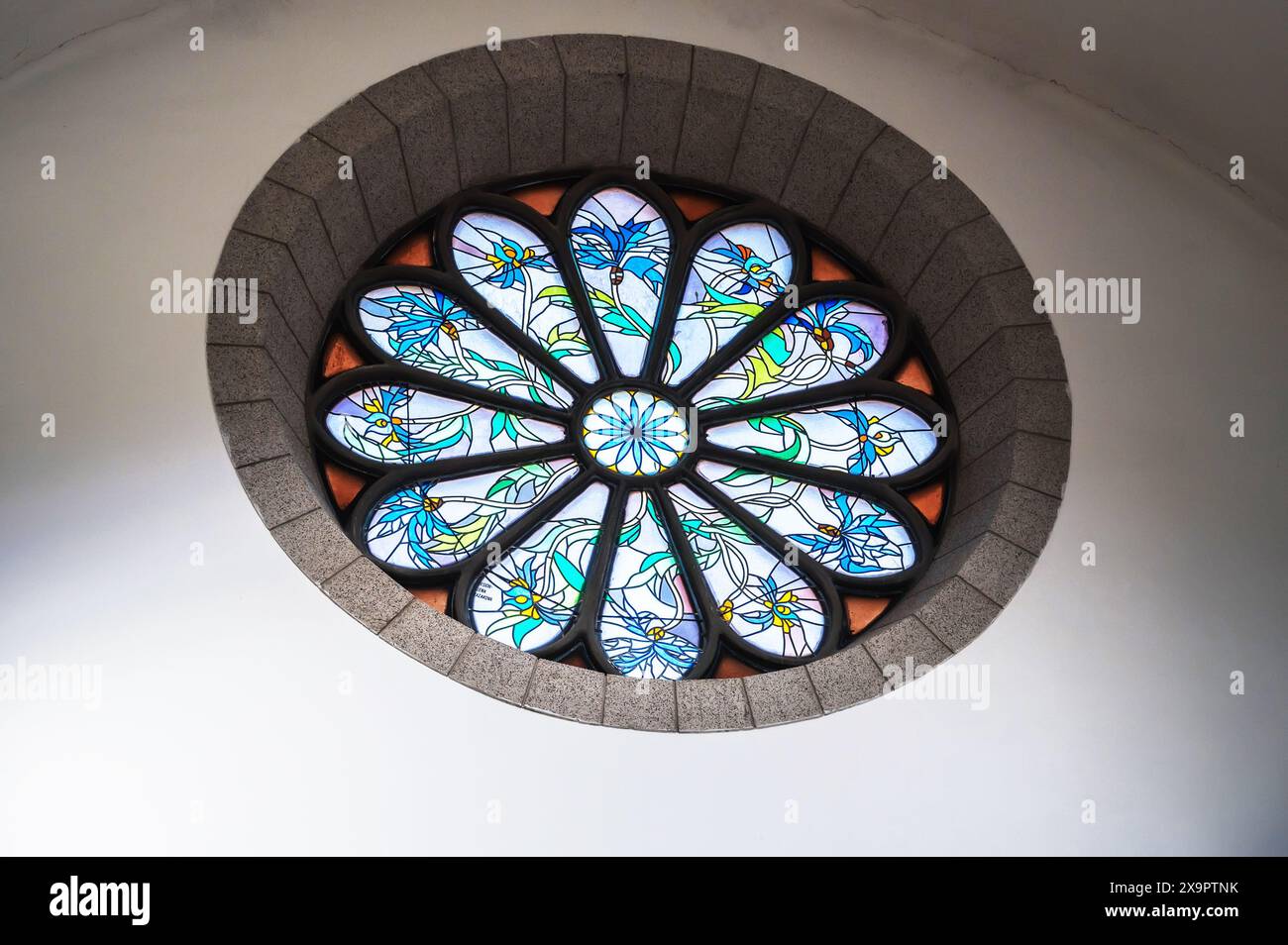 stained glass window decorated with mosaics inside an ancient Christian ...