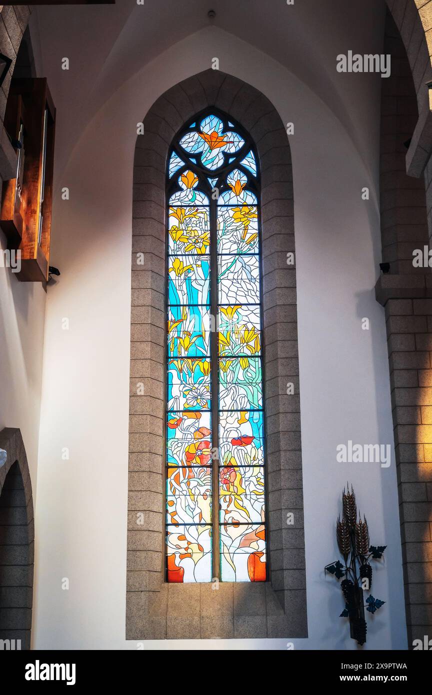 stained glass window decorated with mosaics inside an ancient Christian ...