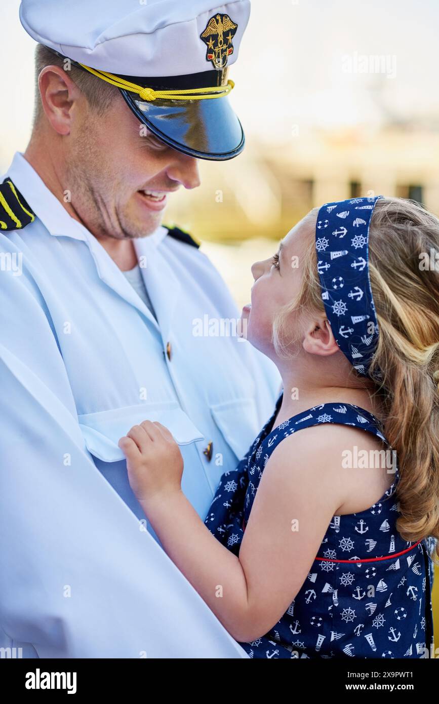 Happy, uniform and father carry child with love relationship, patriotic ...