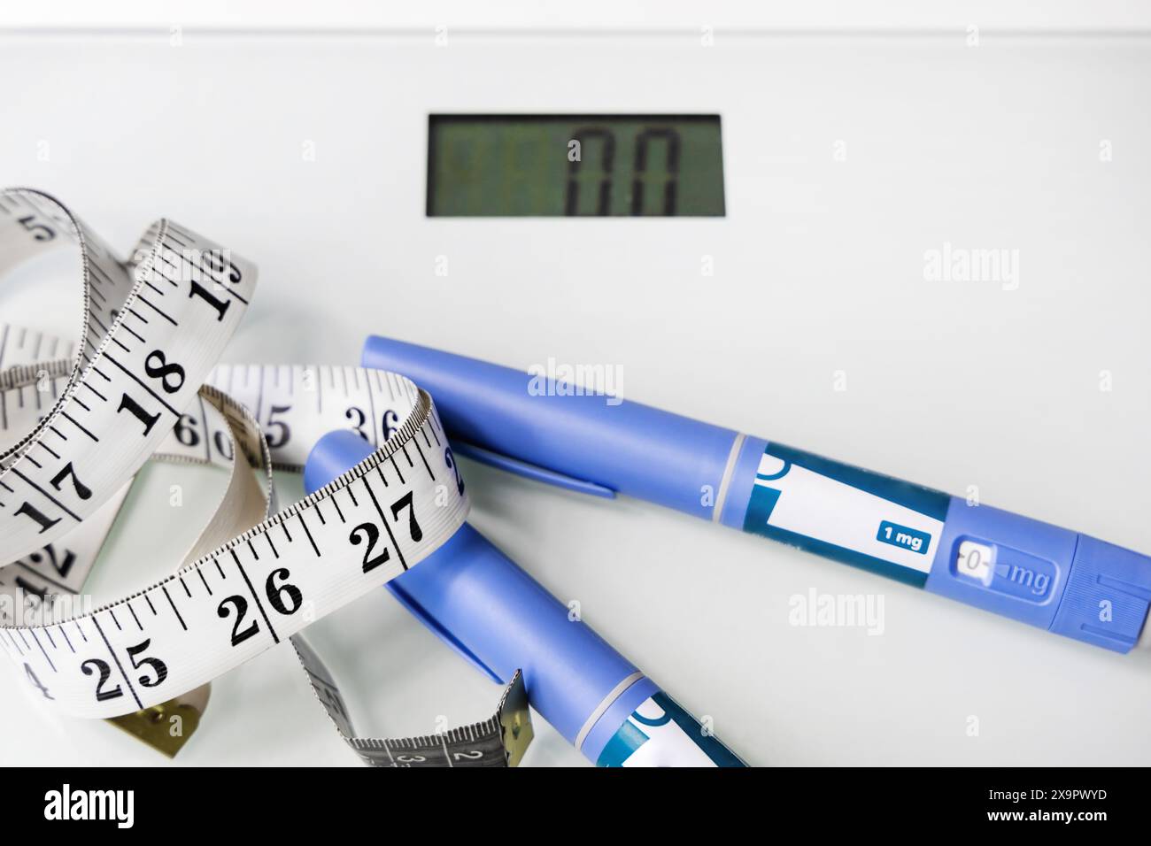 Ozempic Insulin injection pen for diabetics and weight loss. Concept of losing weight with the ...