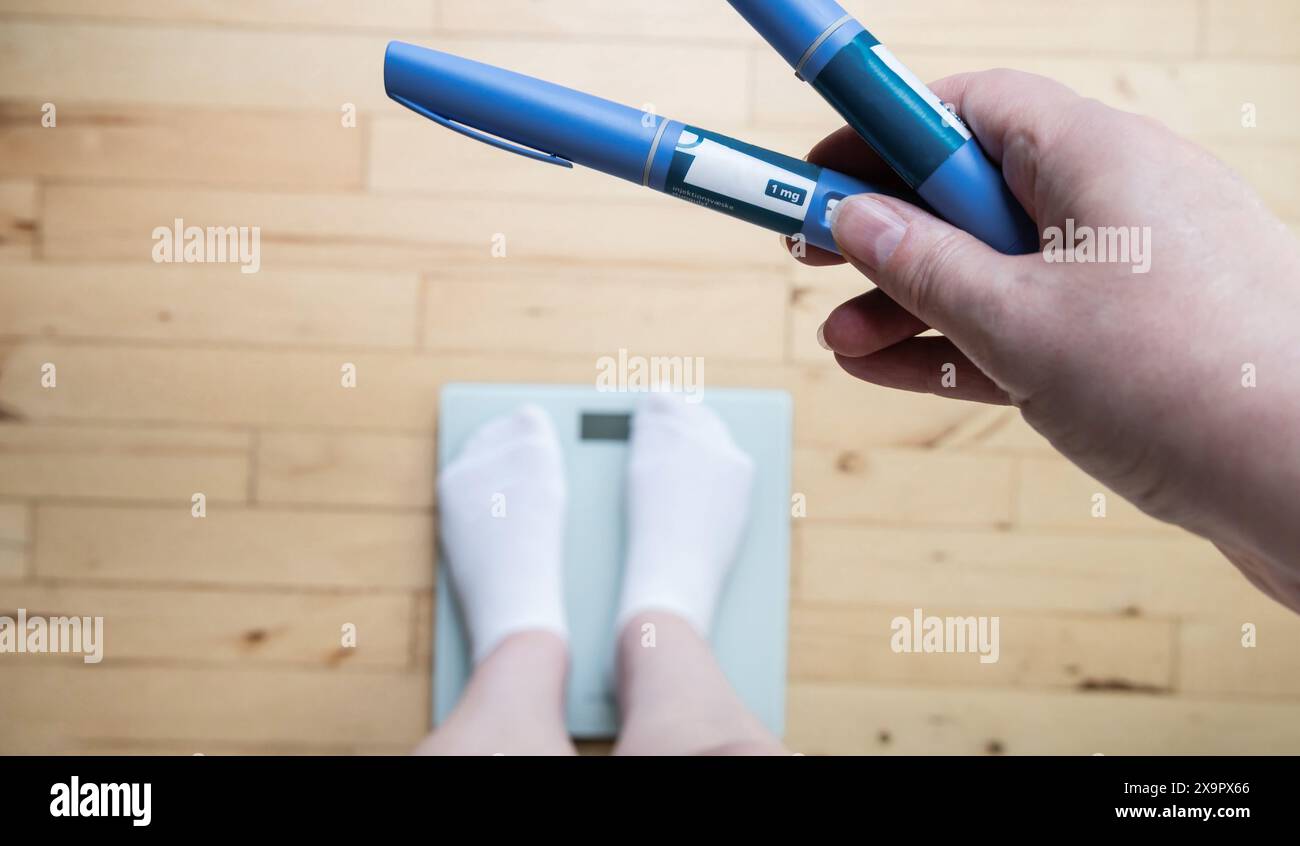 Ozempic Insulin injection pen for diabetics and weight loss. Woman weighs herself and holds ...