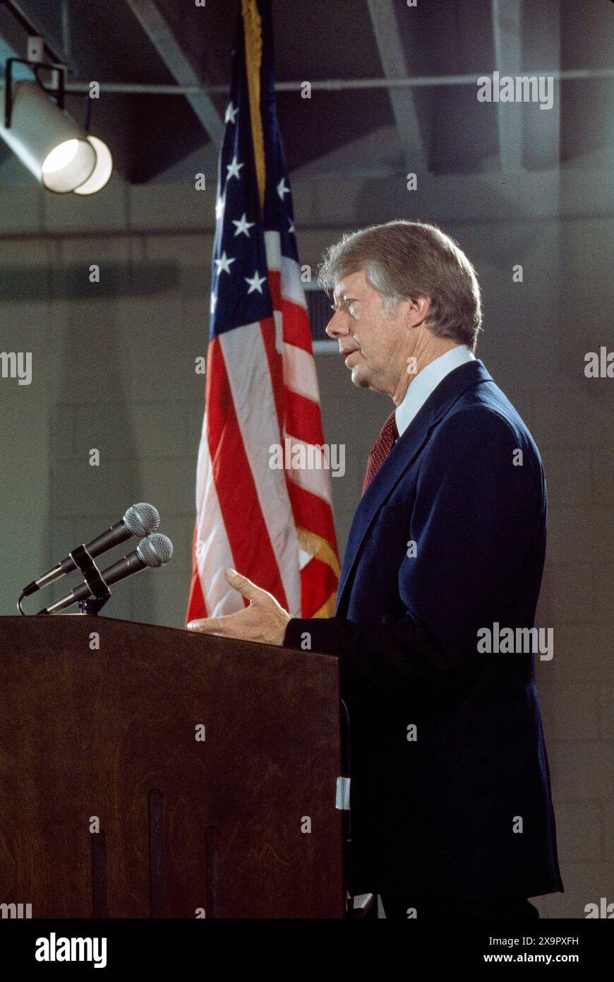 U.S. President Jimmy Carter at podium during news conference, three ...