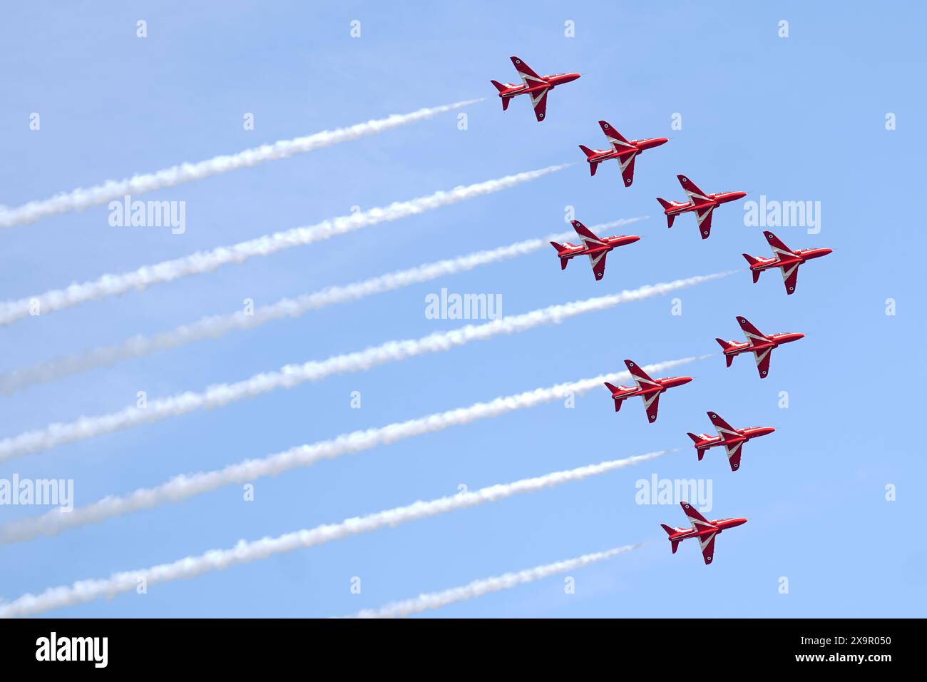 The RAF Red Arrows display team perform during the IWM Duxford Air Show ...