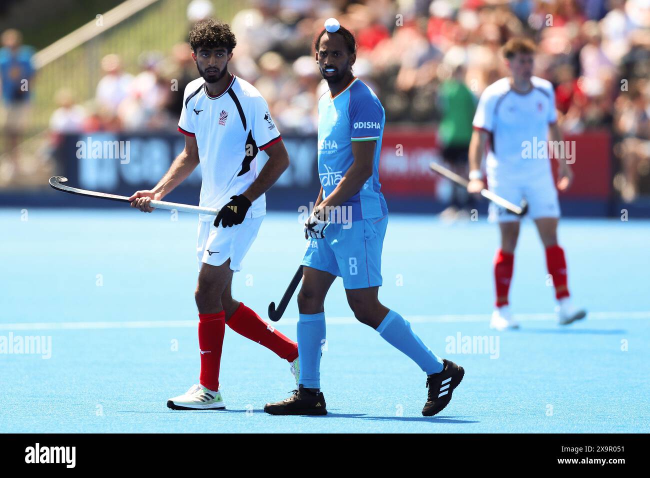 Great Britain's Rohan Bhuhi and India’s Hardik Singh during the FIH ...