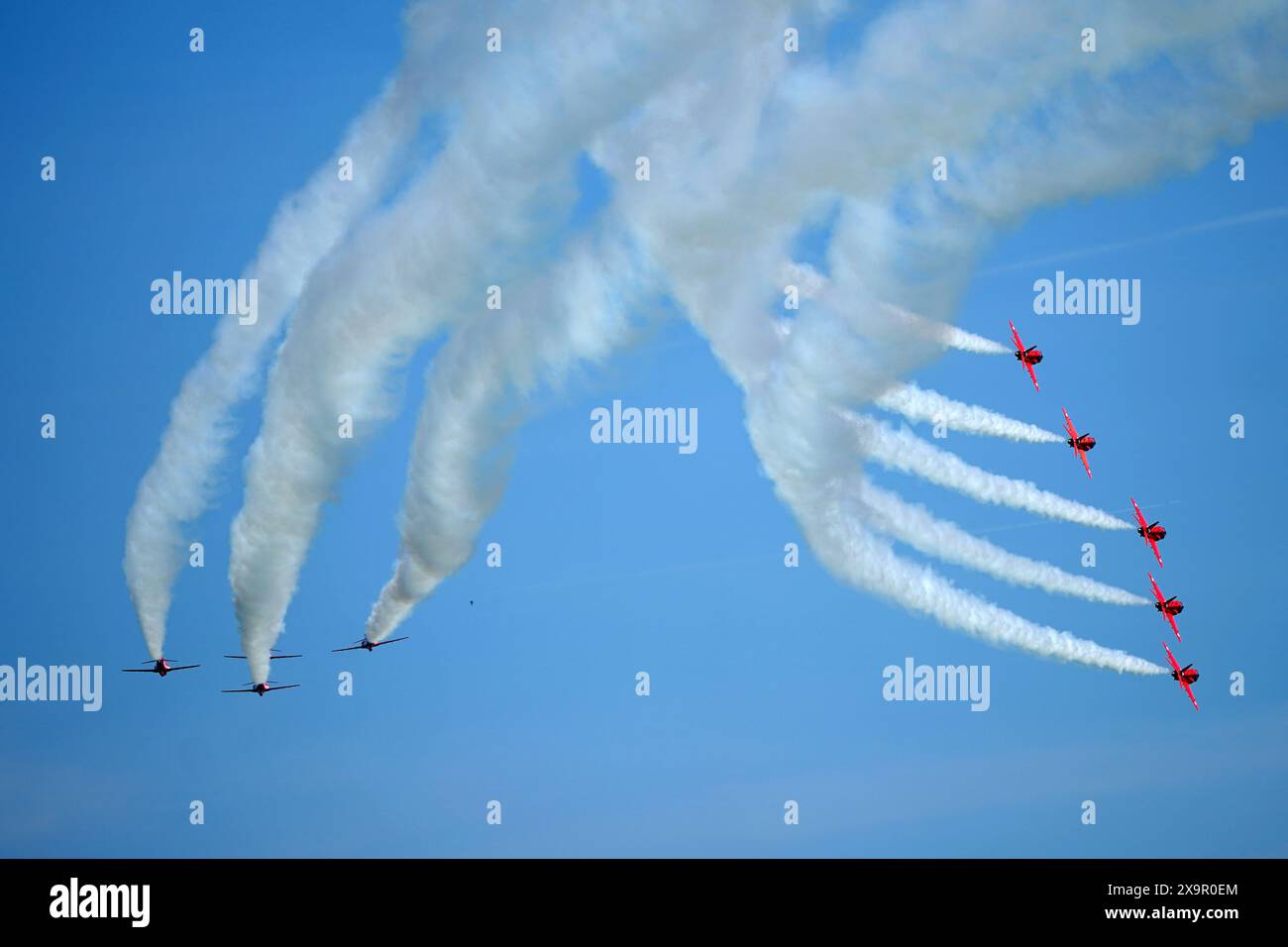 The RAF Red Arrows display team perform during the IWM Duxford Air Show ...