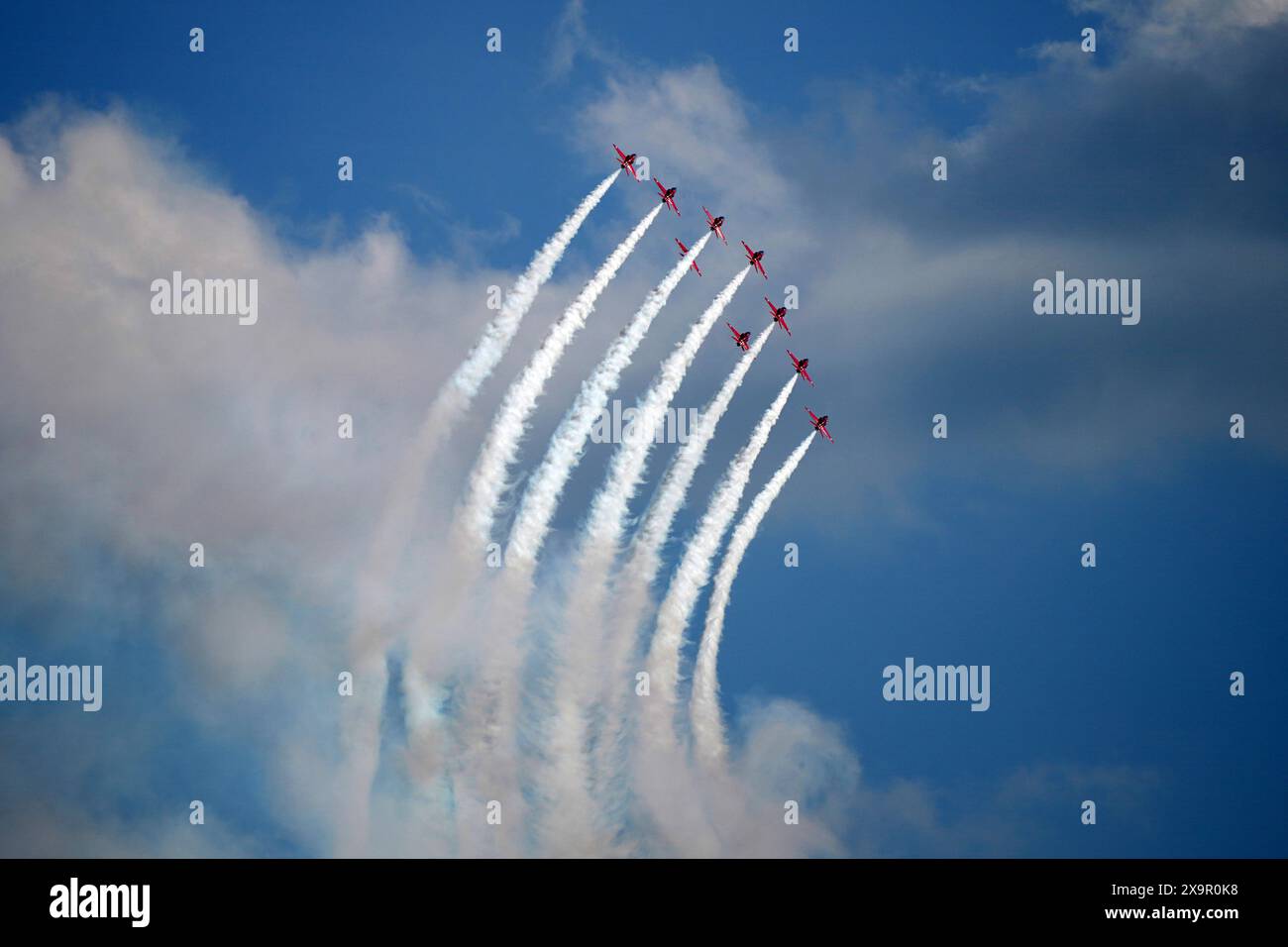 The RAF Red Arrows display team perform during the IWM Duxford Air Show ...
