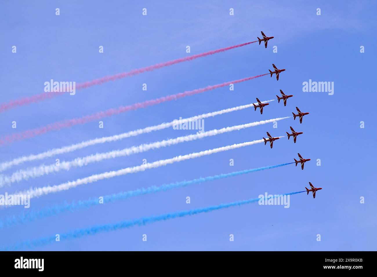 The RAF Red Arrows display team perform during the IWM Duxford Air Show ...