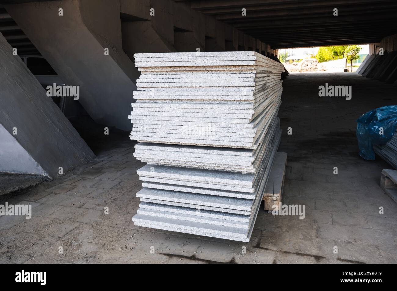 stack of white marble slabs on construction site for the decoration of ...