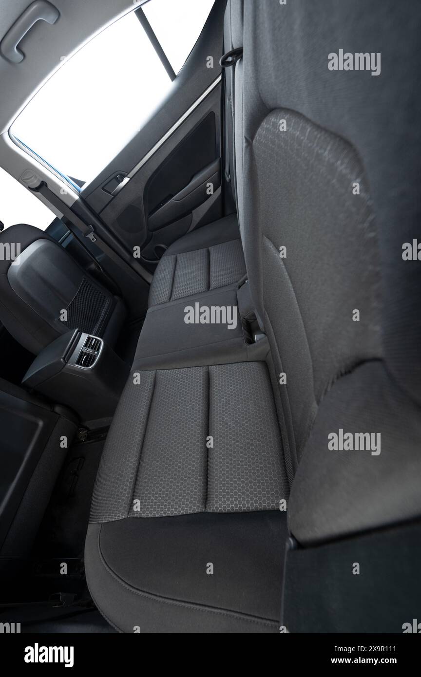 Soft black textile rear car seat with isolated windows above view Stock ...