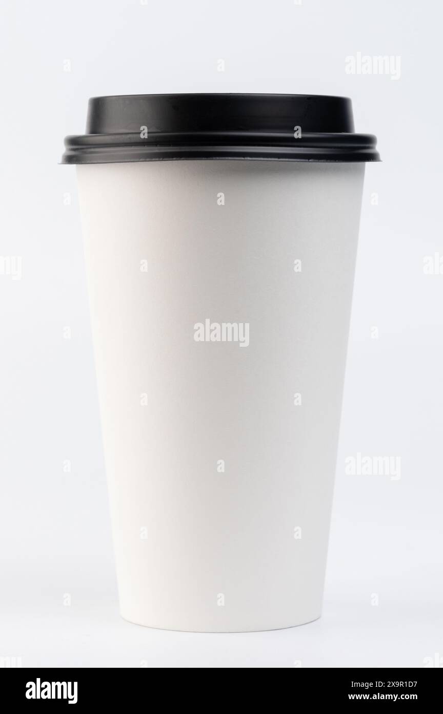 Generic paper cup with plastic lid front view isolated on white studio ...