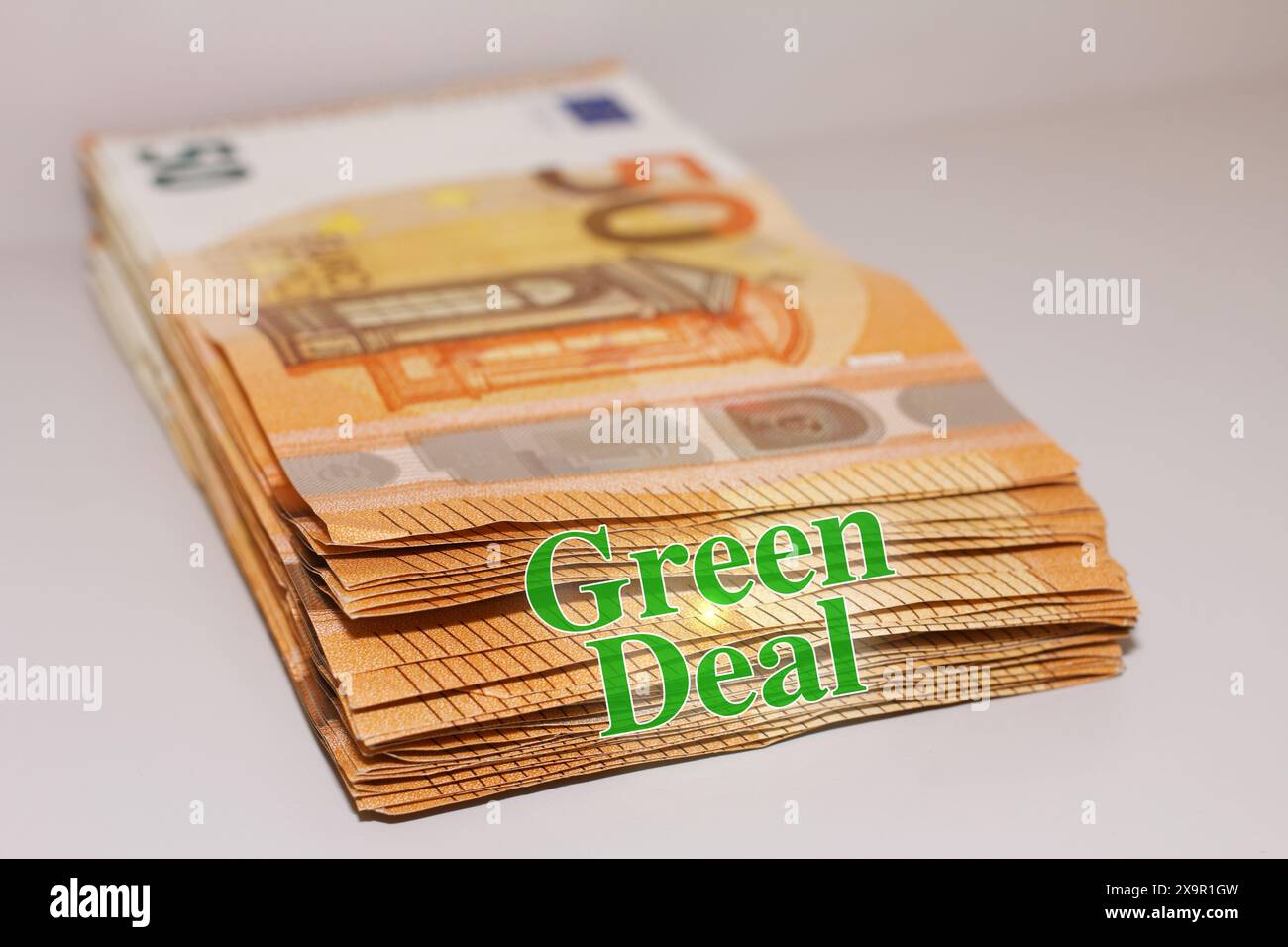 Banknotes with the text "Green Deal" in green color Stock Photo - Alamy