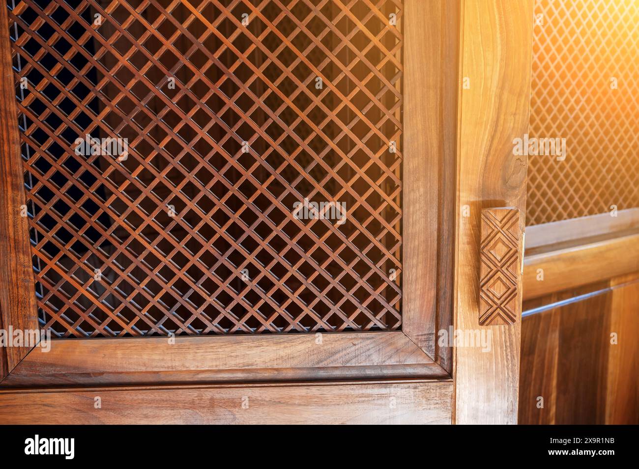 open door with lattice to wooden confessional booth for confession ...