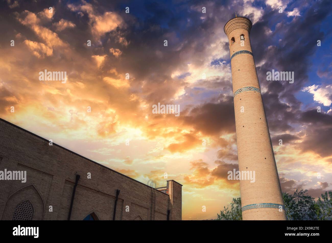 ancient old minaret of the Hast Imam mosque on background at beautiful ...