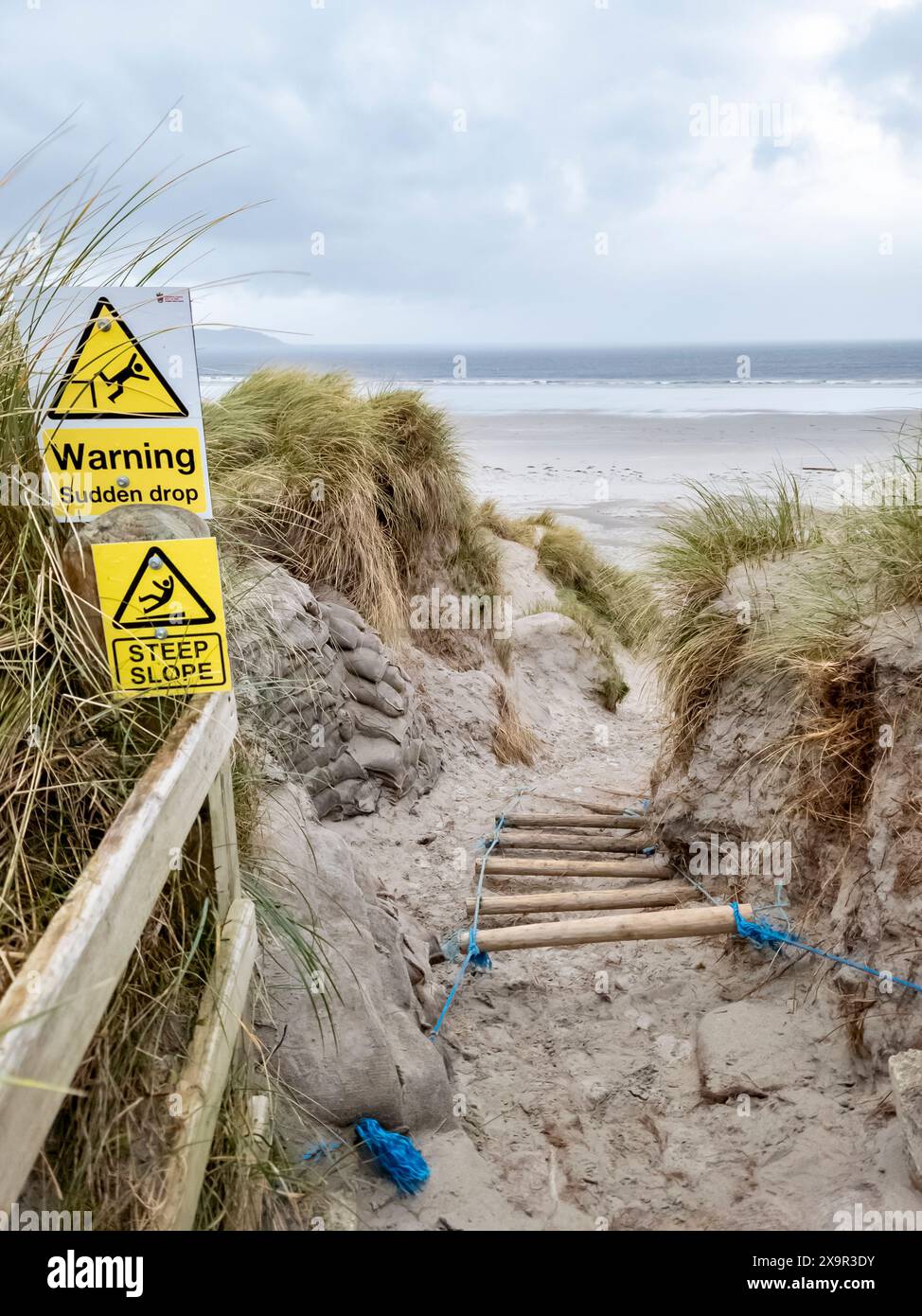 Signs warning of Sudden Drop and Steep Slope at Dooey beach by ...
