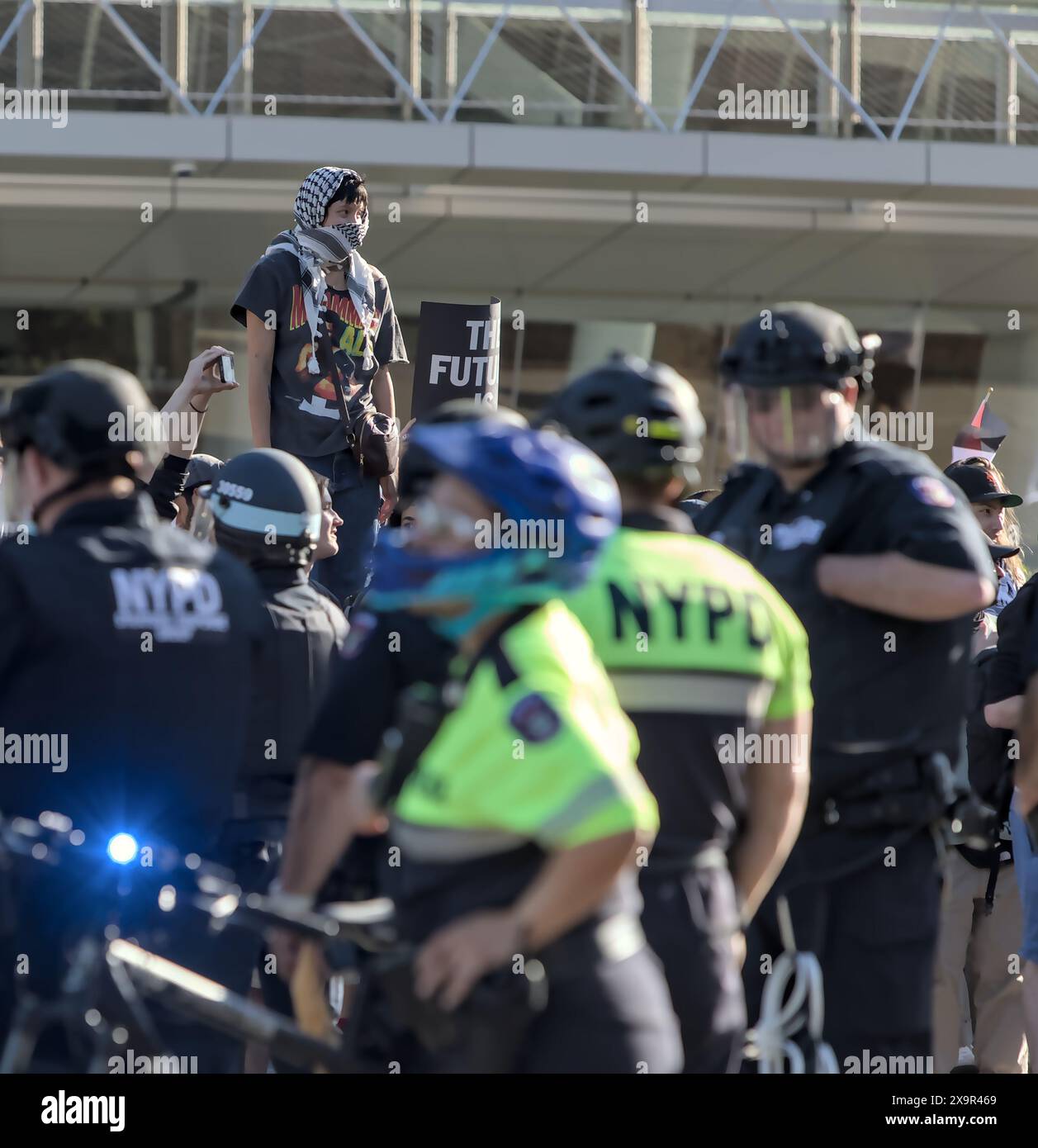 Brooklyn, NY - May 31 2024: NYPD officers with bicycles and helmets ...
