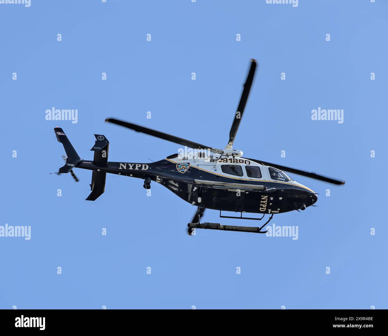 Brooklyn, NY - May 31 2024: NYPD helicopter hovers over buildings in ...