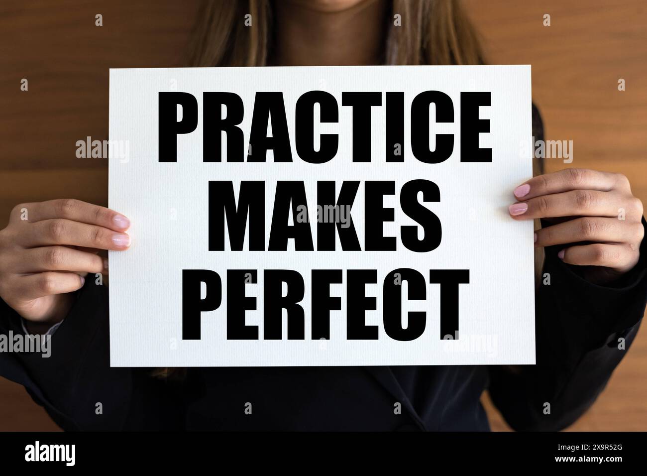 Practice makes Perfect Practice makes perfect. Woman with white page ...