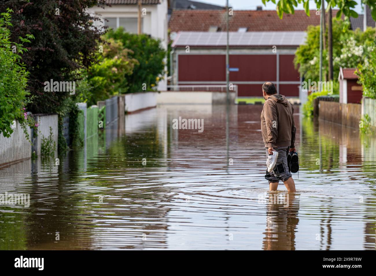 Baar Ebenhausen, Germany. 02nd June, 2024. A man walks through a ...