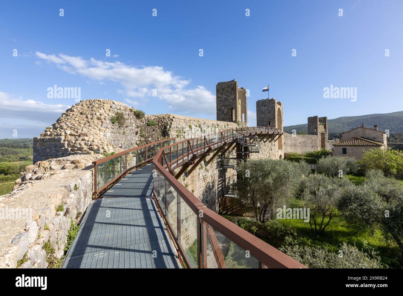 The walkway and towers on the city walls of the historic medieval ...