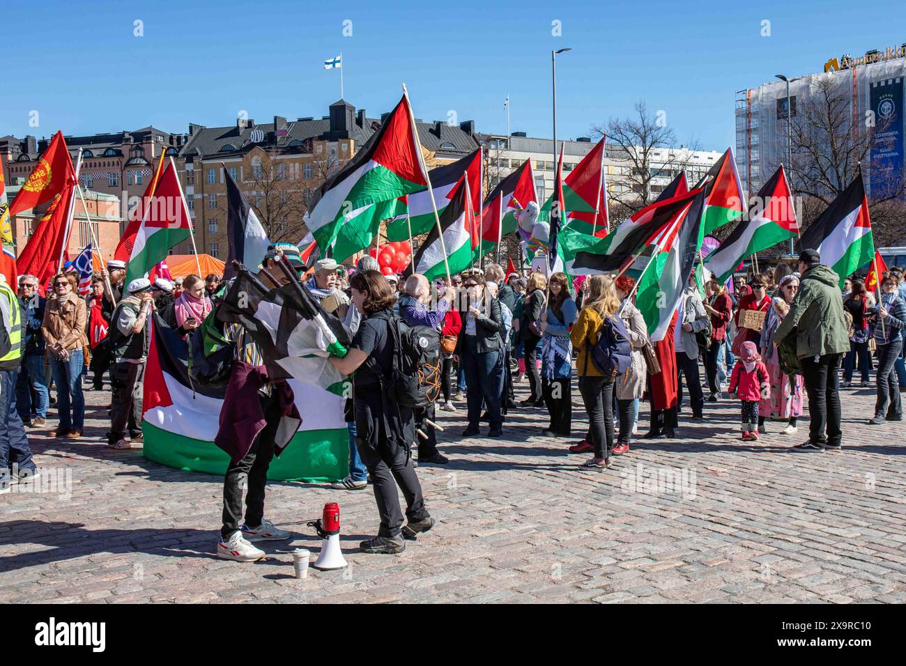 Palestinian flags on Hakaniemi Market Square before Labor Day march in ...