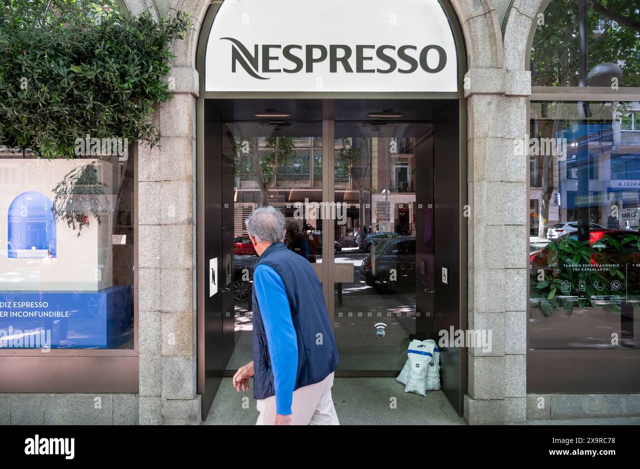 A pedestrian walks past the Swiss high-end and world leader in coffee ...