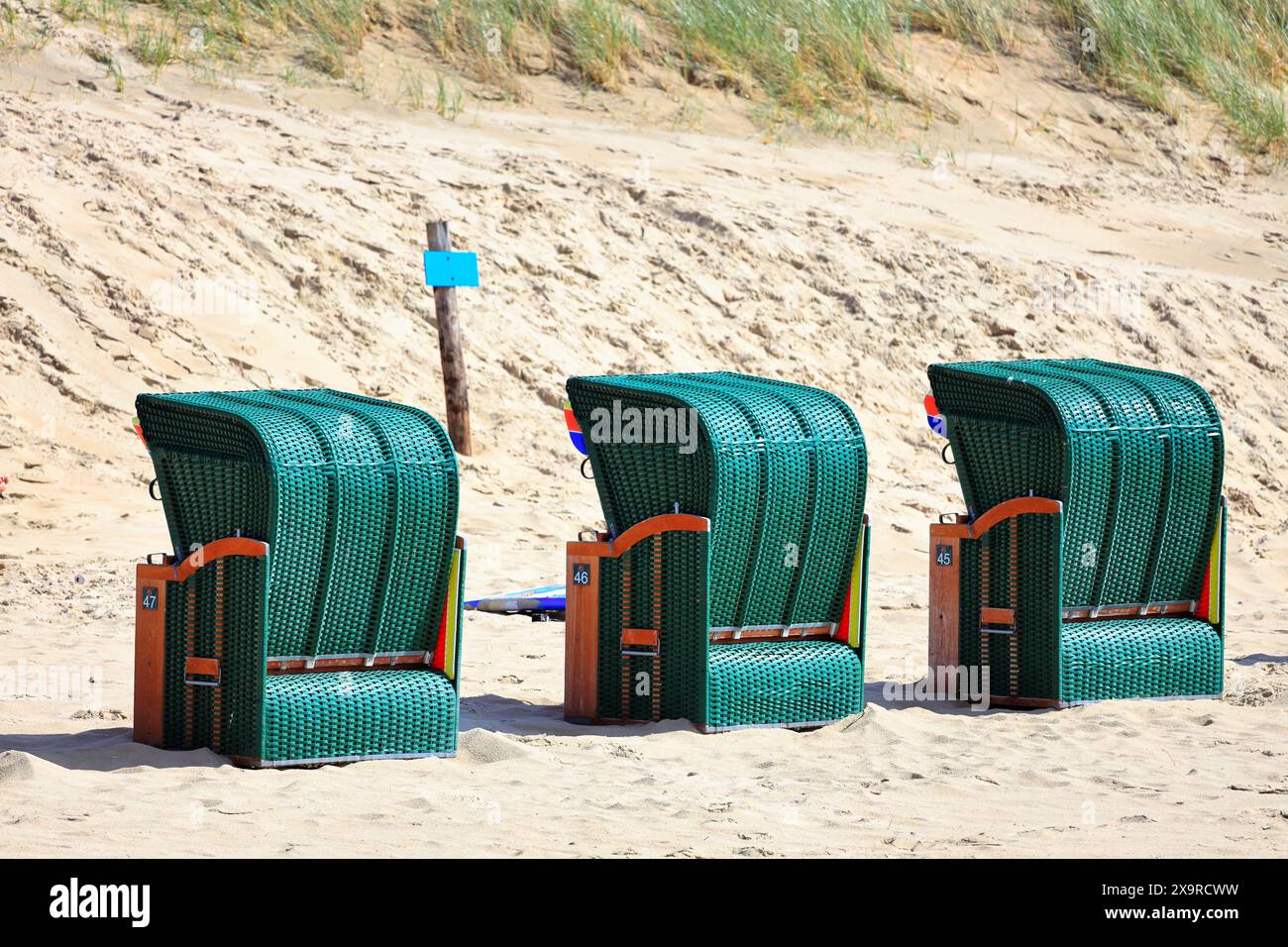 Roofed wicker beach chairs. Egmond aan Zee, North Sea, the Netherlands ...