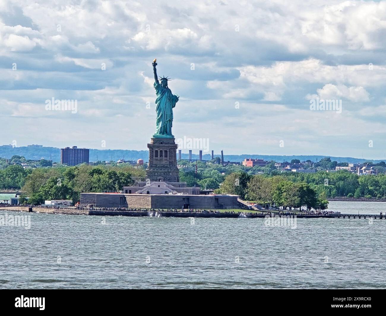 View of the Statue of Liberty lighthouse and Liberty Island from the ...