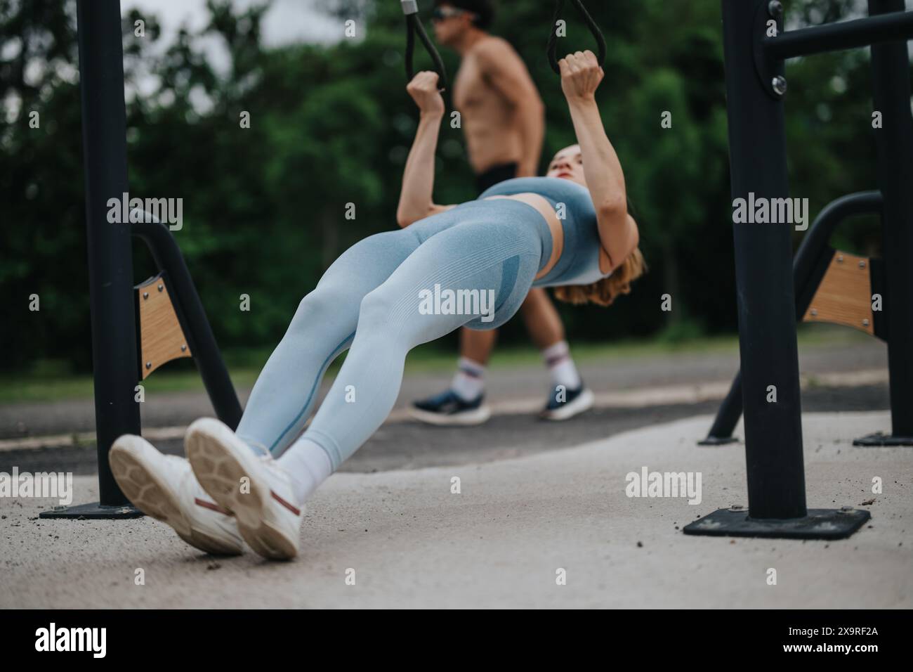 Woman performing calisthenics in hi-res stock photography and images ...