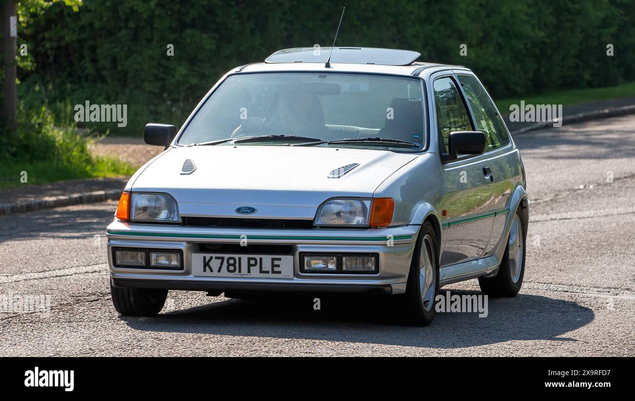 Stoke Goldington,UK - May 11th 2024: 1992 Ford Fiesta car driving on a ...