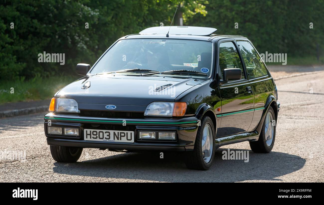 Stoke Goldington,UK - May 11th 2024: 1991 Ford Fiesta car driving on a ...