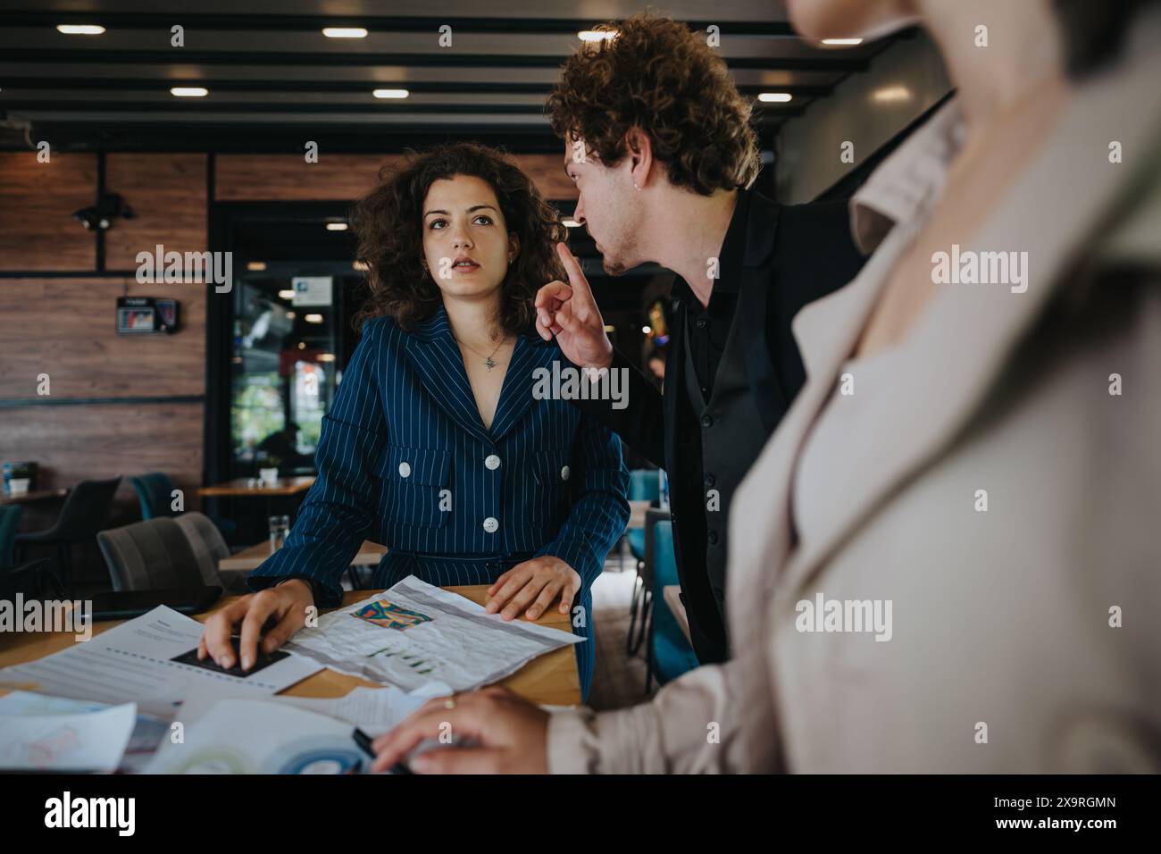 Business colleagues having a misunderstanding and arguing in a modern ...