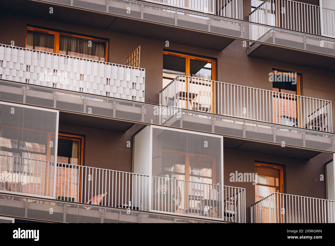 Modern facade of house with residential apartments, steel decorative ...