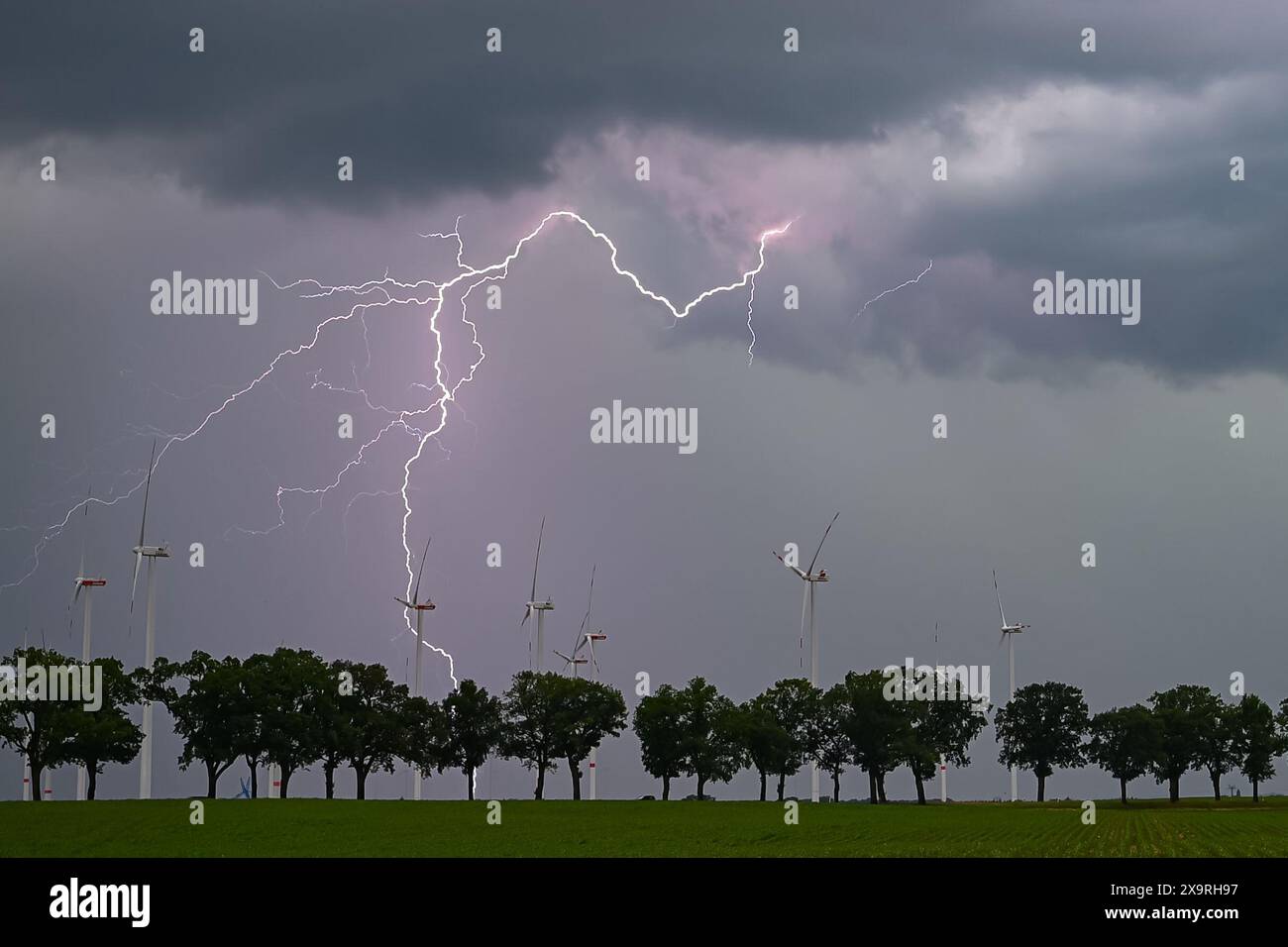 Sieversdorf, Germany. 02nd June, 2024. Lightning flashes across the ...