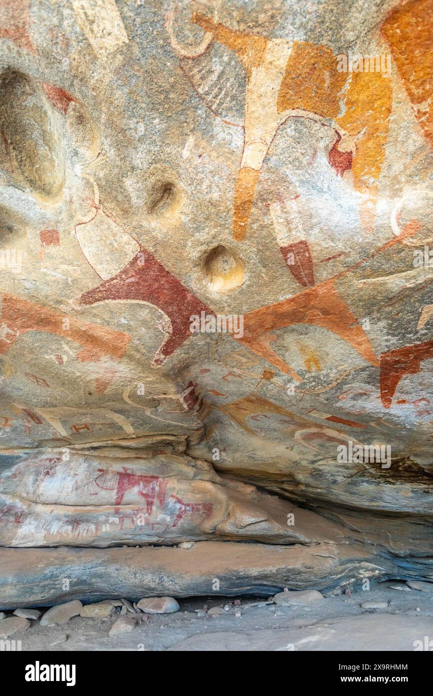 Ancient tribal rock artwork primitive carvings of men and livestock ...