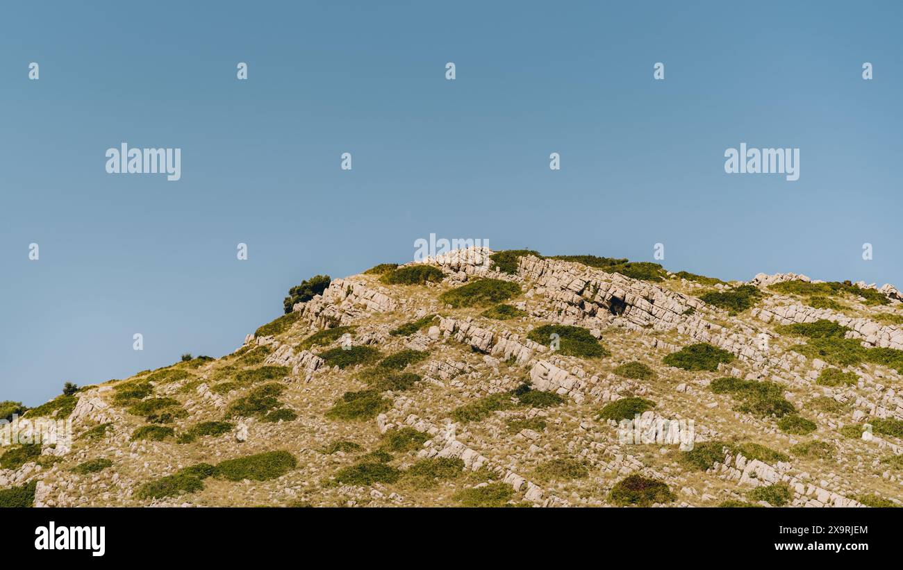 Rugged hill with rows of rocks in Dugi Otok island, Telascica Nature ...
