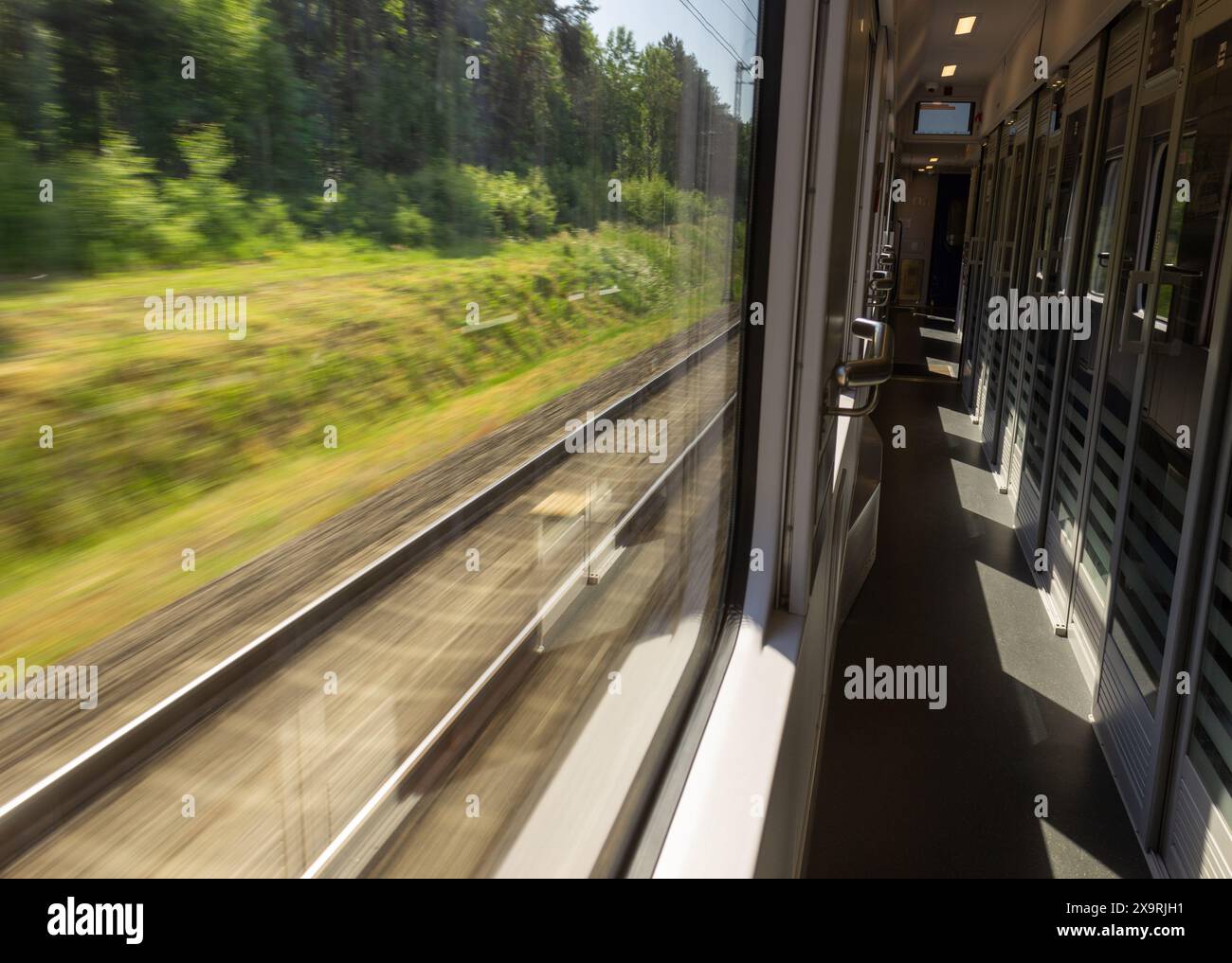view from the window of a moving train , moving carriage, travel concept, picture in moving ...