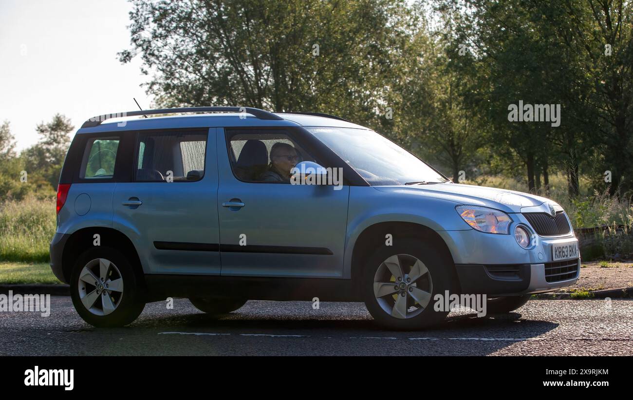 Stony Stratford,UK - June 2nd 2024: 2013 blue Skoda Yeti car driving on ...