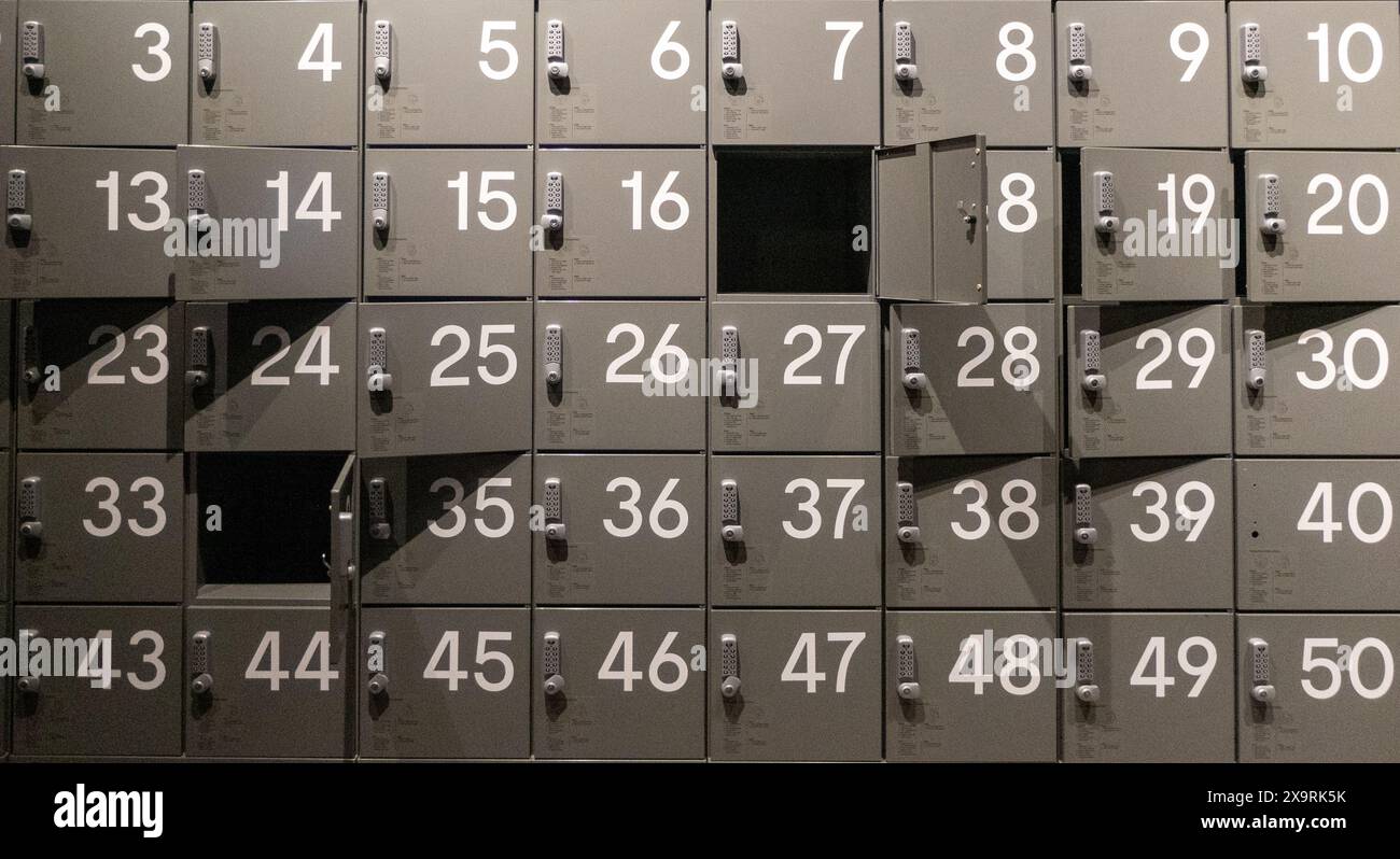 numbered lockers at public building Stock Photo - Alamy